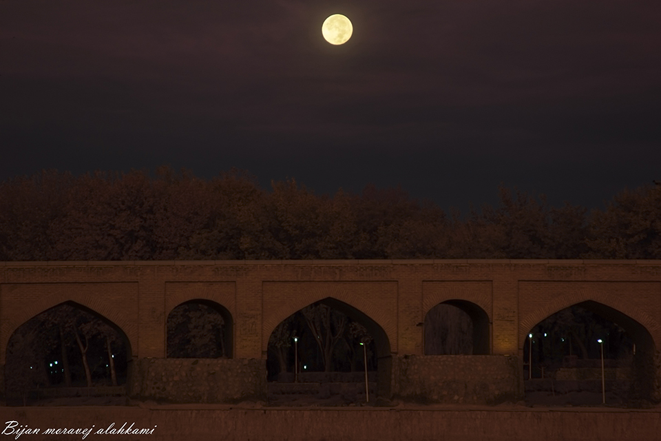 super full moonset on top of the Marnan bridge - Sky & Telescope