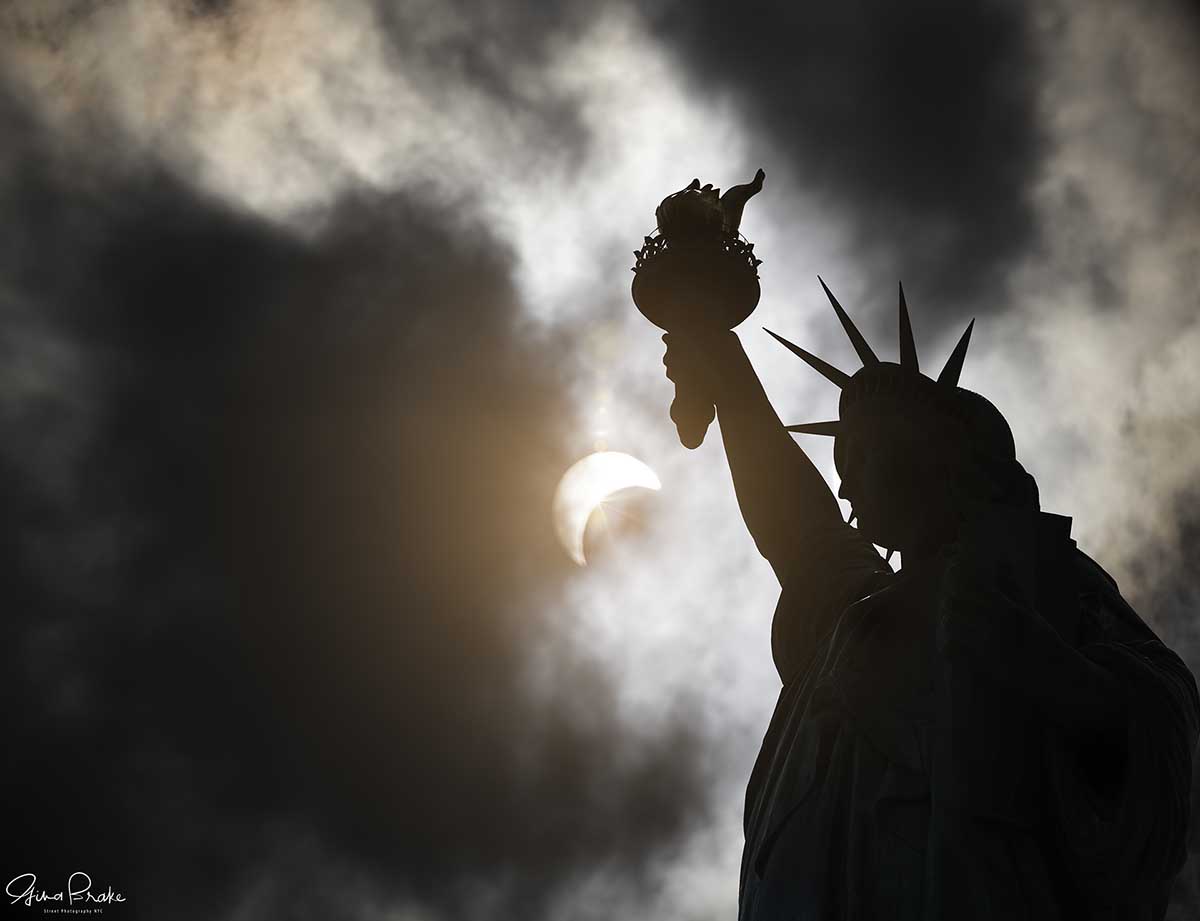 The Solar Eclipse Over the Statue of Liberty - Sky & Telescope