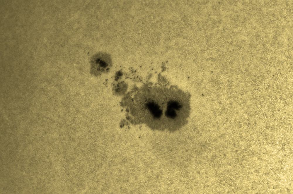 AR4079 Giant Sunspot with Eyes - Sky & Telescope