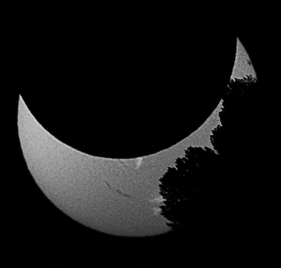 Eclipse at Sunset | Chris Hemstock - Sky & Telescope