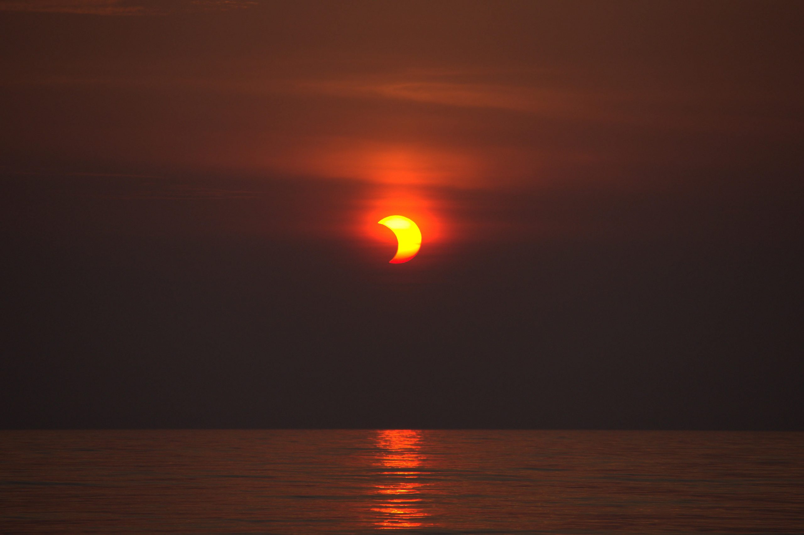 Eclipse at Sunrise - Sky & Telescope