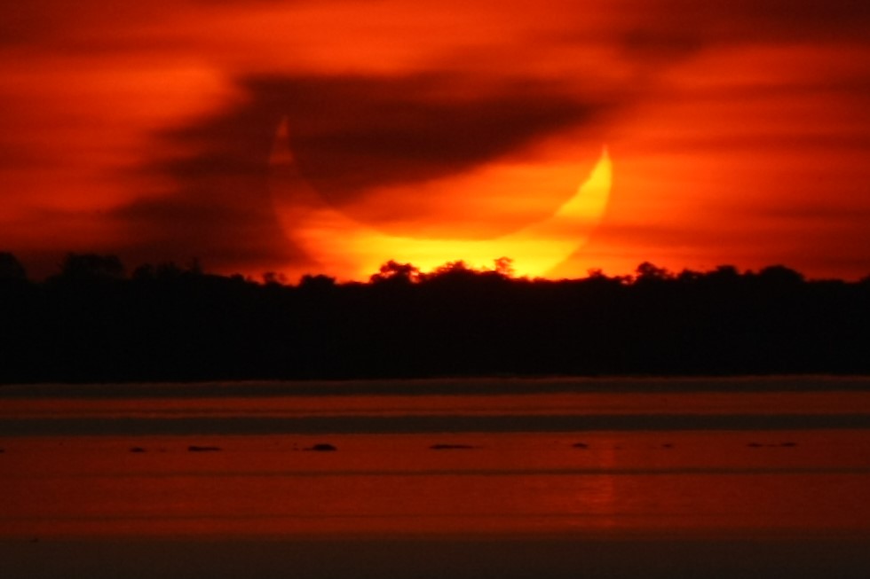 Partial Eclipse of the Sun Just After Sunrise - Sky & Telescope