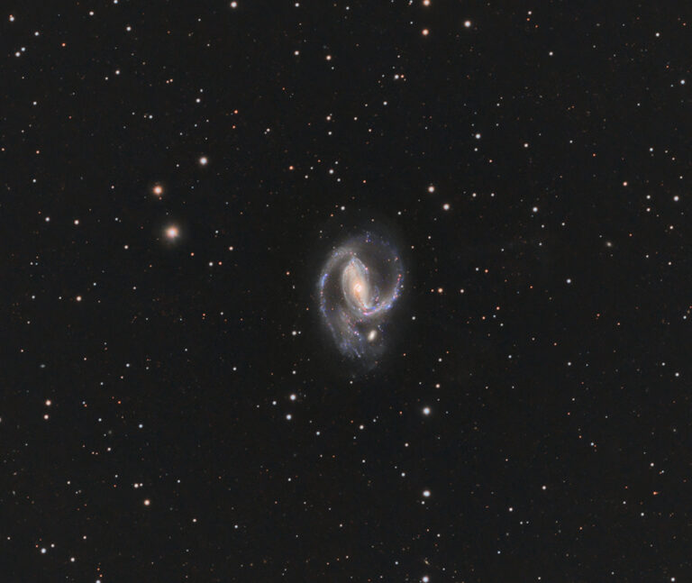 NGC 1097 - Barred spiral galaxy - Sky & Telescope