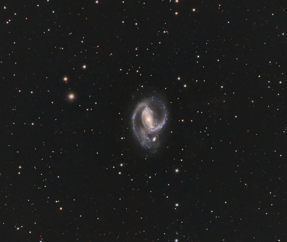 NGC 1097 - Barred spiral galaxy - Sky & Telescope
