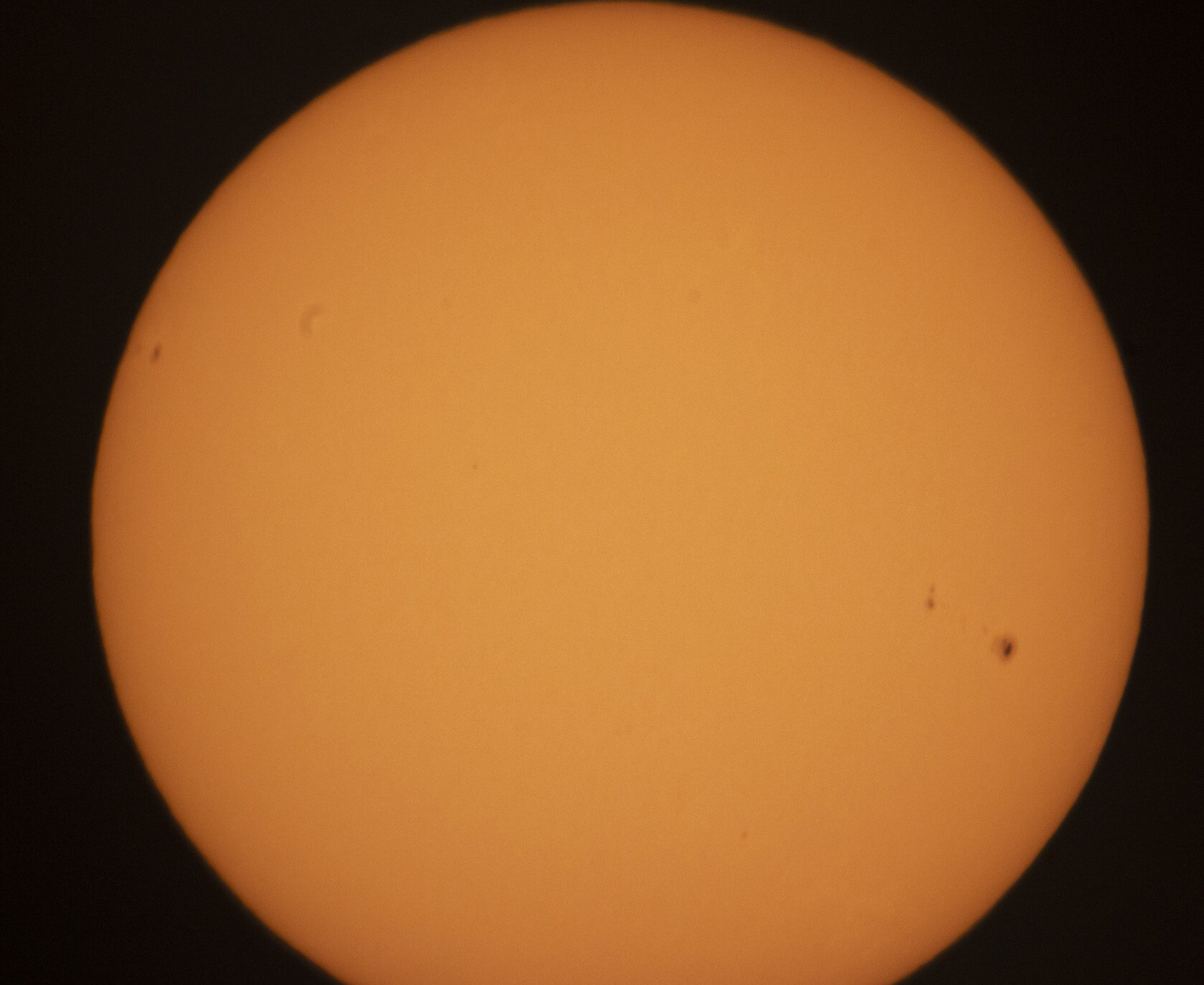 Sun through a homemade solar filter - Sky & Telescope