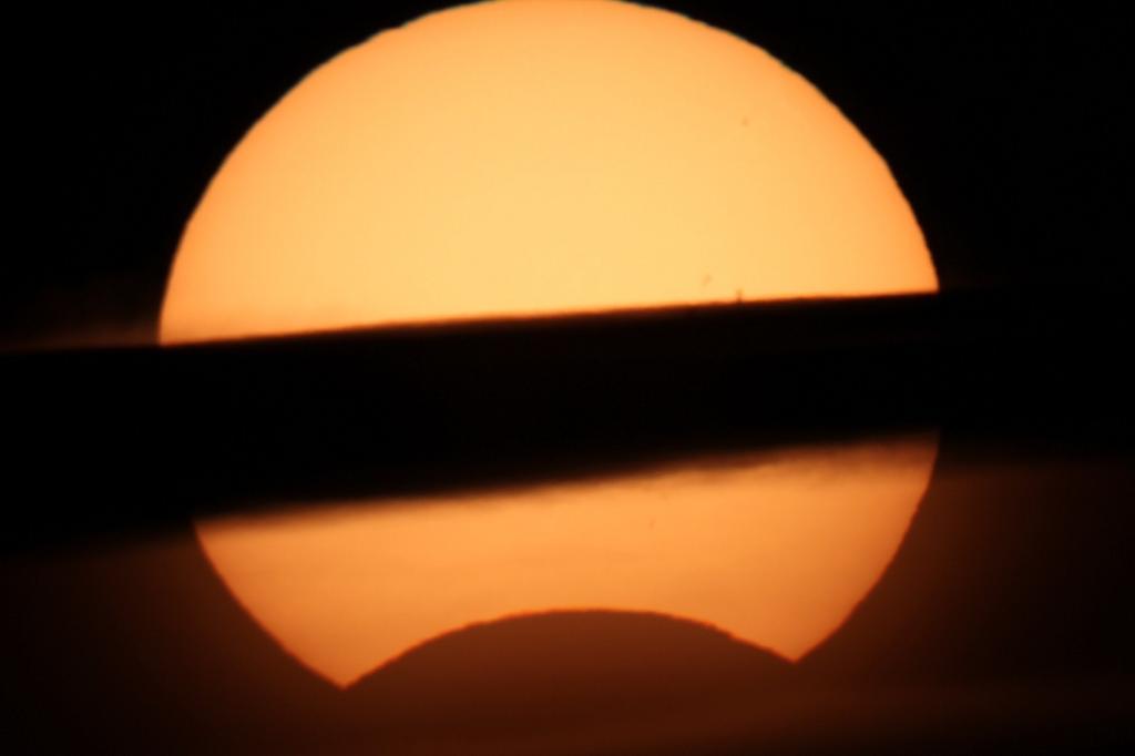 Moon and clouds over the Sun | Lucian Gurban - Sky & Telescope - Sky ...