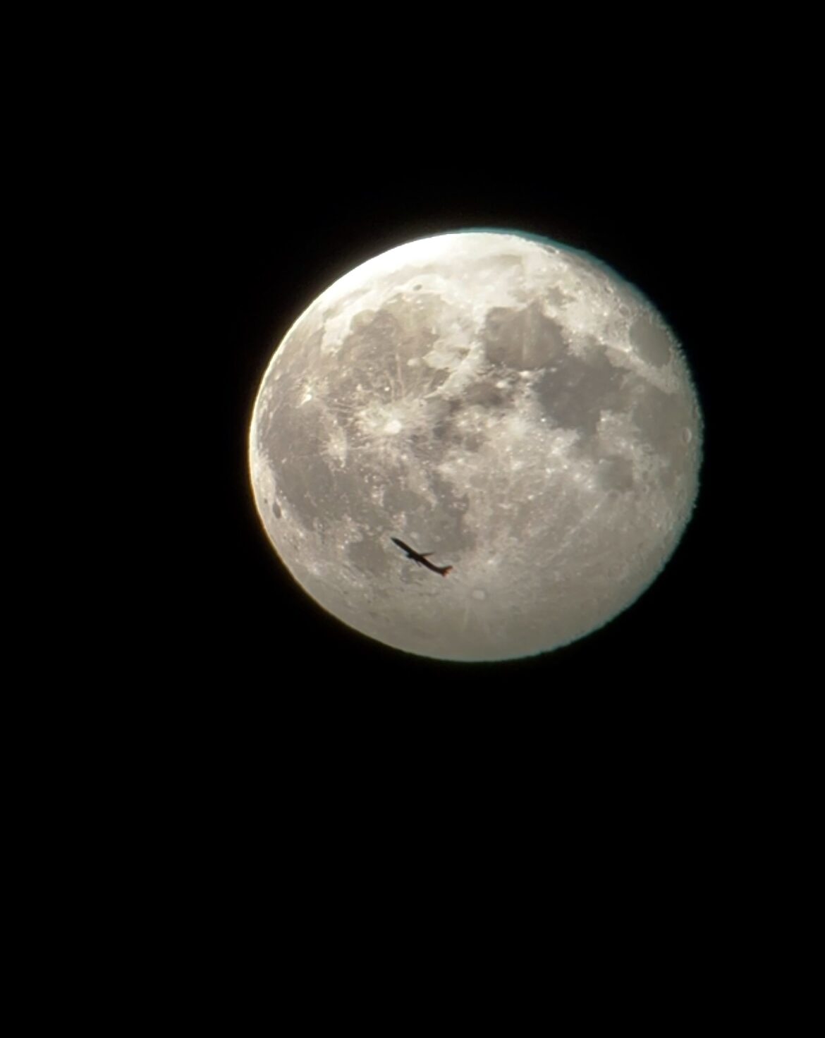 Moon with plane - Sky & Telescope - Sky & Telescope